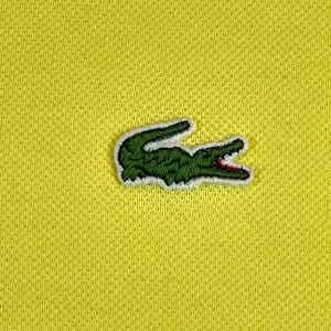 Lacoste | Shirts | Lacoste Devanlay Yellow Pique Polo Shirt Mens 7 ...